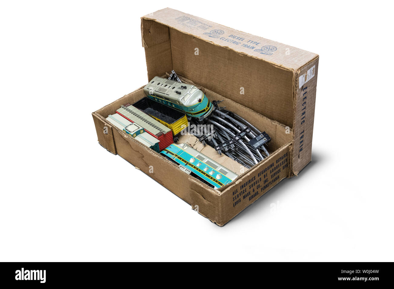 A vinage cardboard box containing an electric train toy (the baby ...