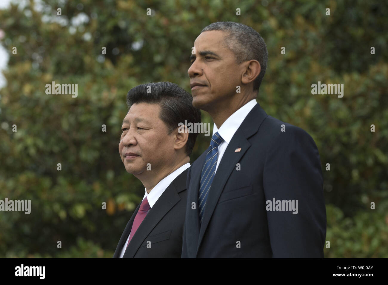 President Barack Obama and Chinese President Xi stand during an ...