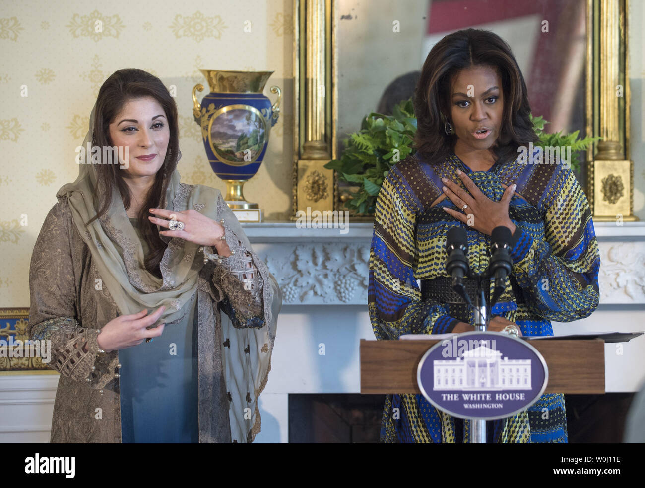 First Lady Michelle Obama makes a comment with Mariam Safdar, daughter ...