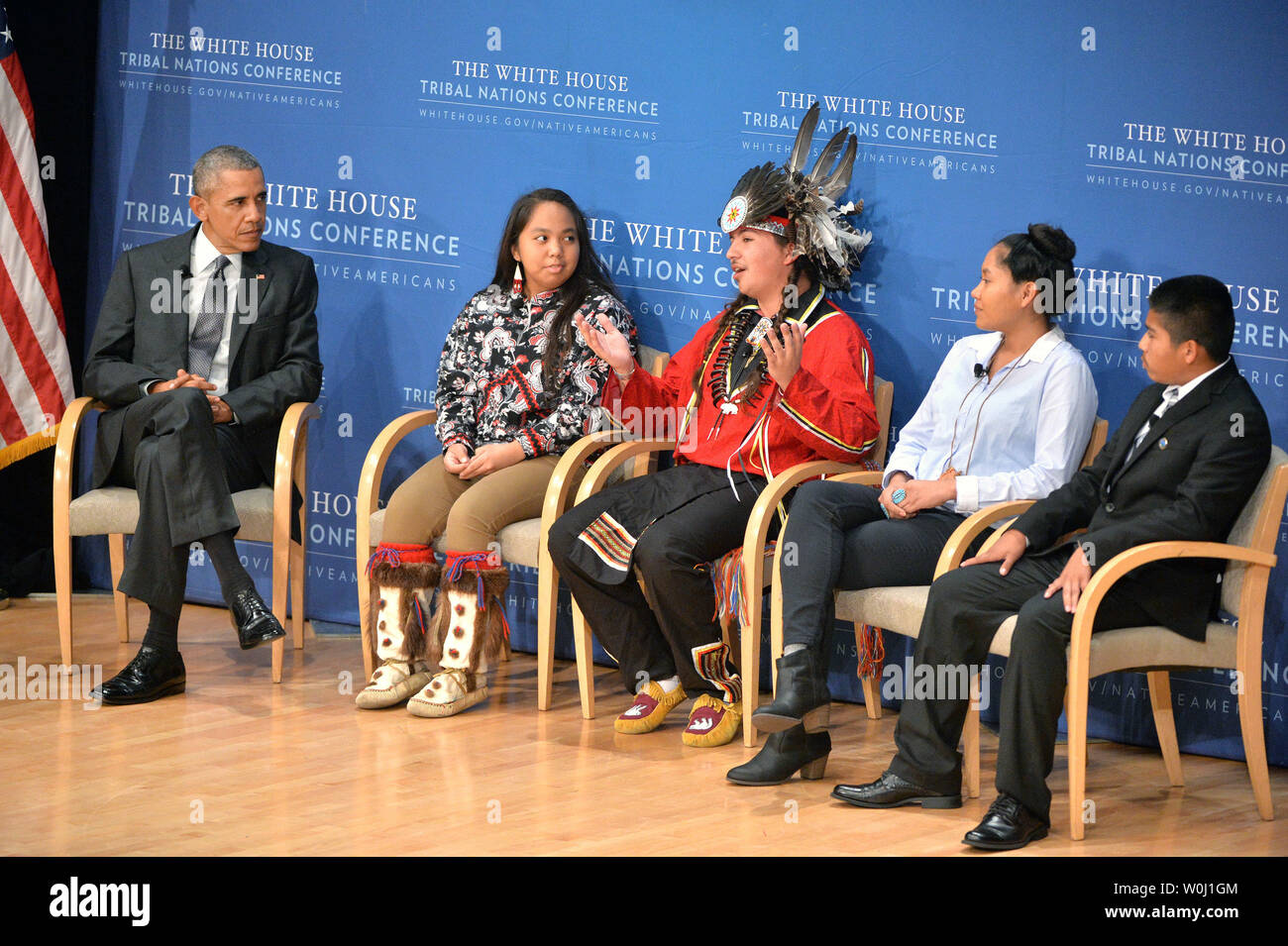 President Barack Obama (L) participate in a panel discussion with, from ...