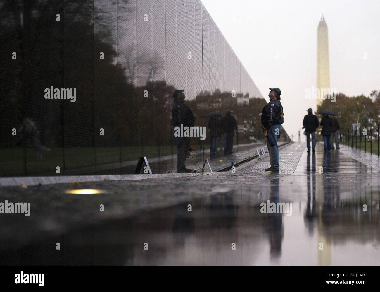 People visit the Vietnam Veteran's Memorial a day before Veteran's Day ...