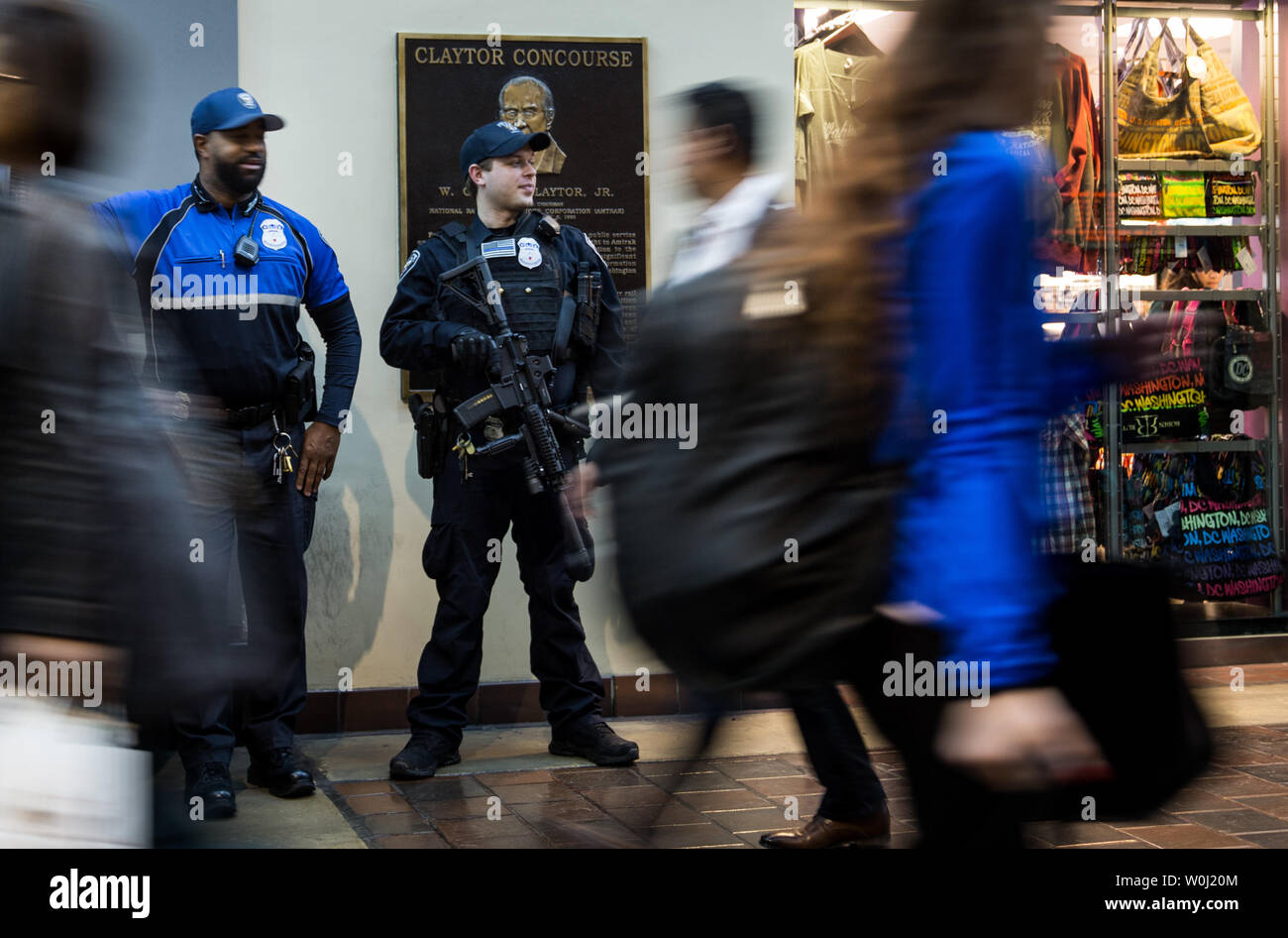 Amtrak Police officers stand guard inside Washington D.C.'s busy Union ...