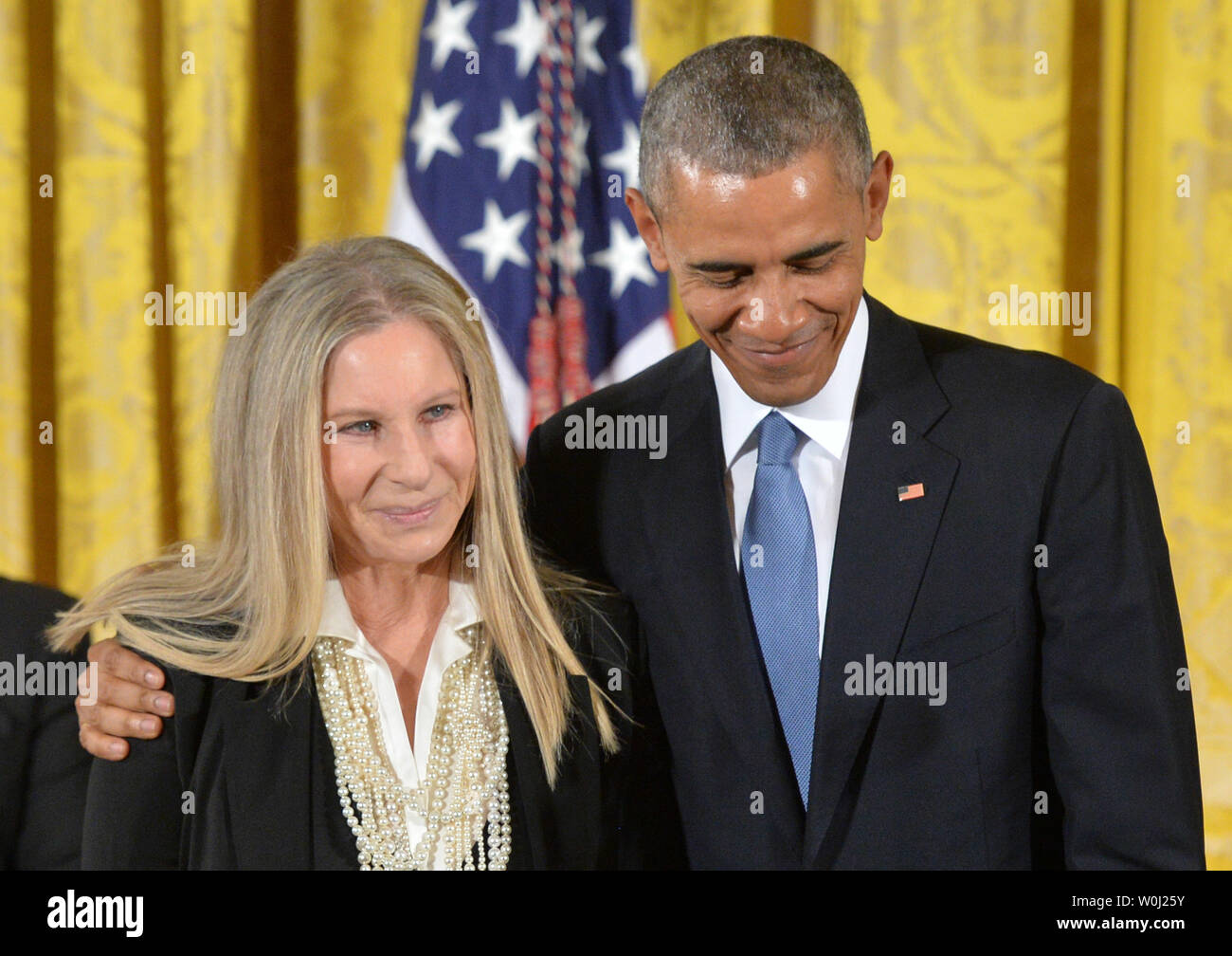 President Barack Obama awards the Medal of Freedom to singer Barbra ...