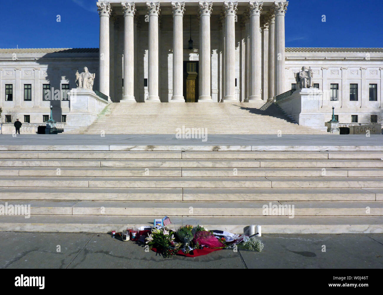 A makeshift memorial is set up on the steps U.S. Supreme Court ...