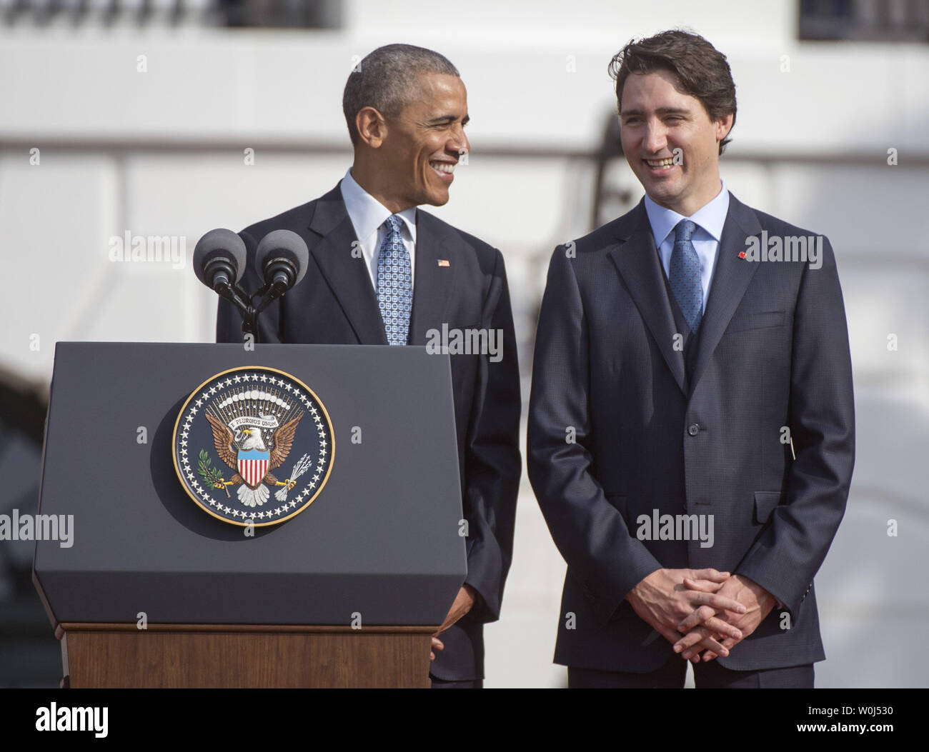 President Barack Obama and Canadian Prime Minister Justin Trudeau laugh ...