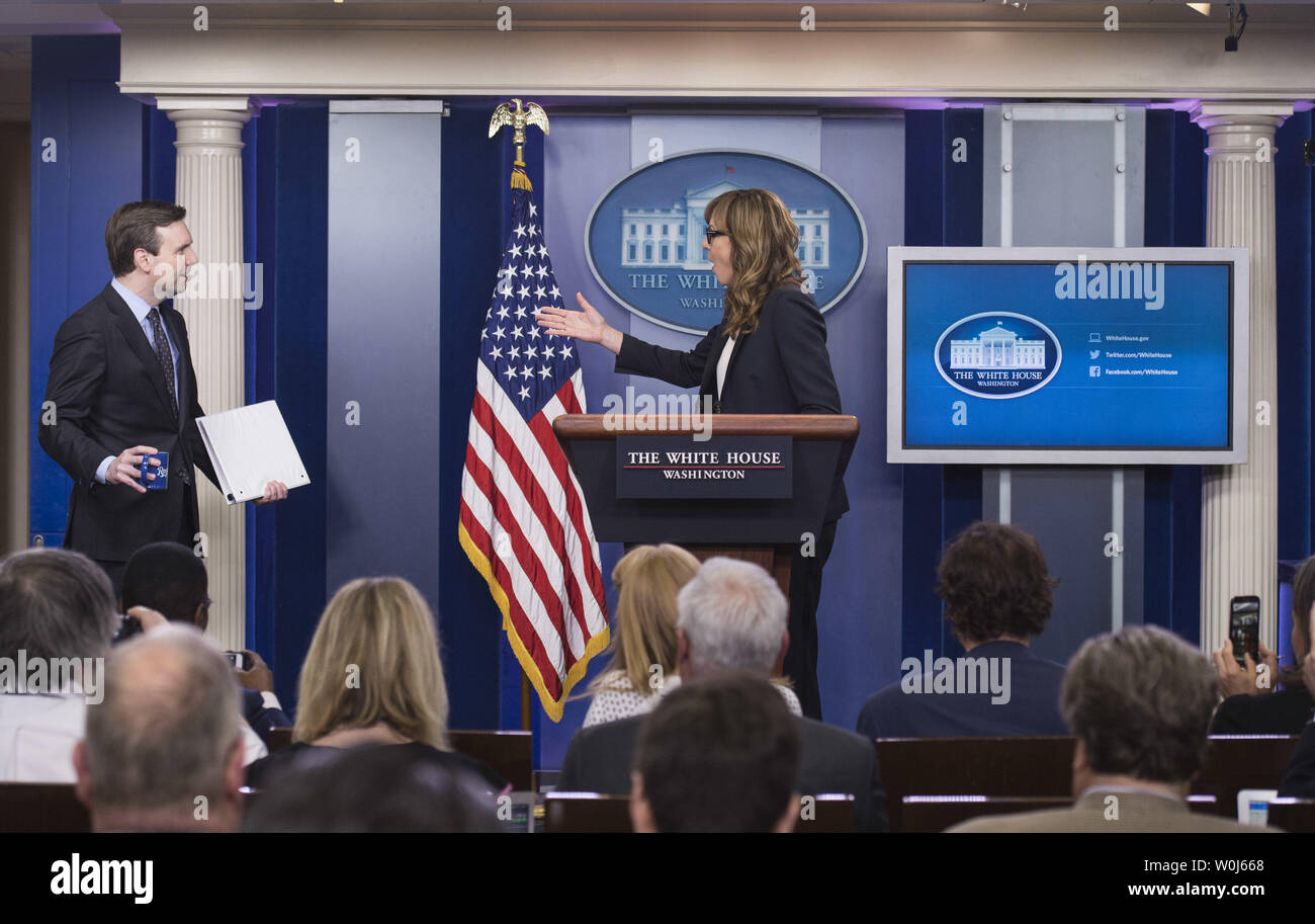 White House Press Secretary Jay Carney (L) jokes with Actress Allison ...