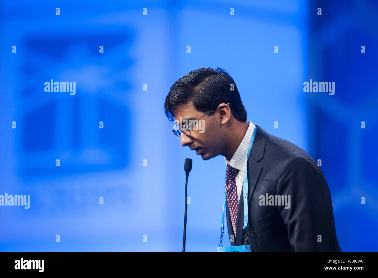 Tharein S. Potuhera, 14, of Omaha, NE, participates in the final round ...