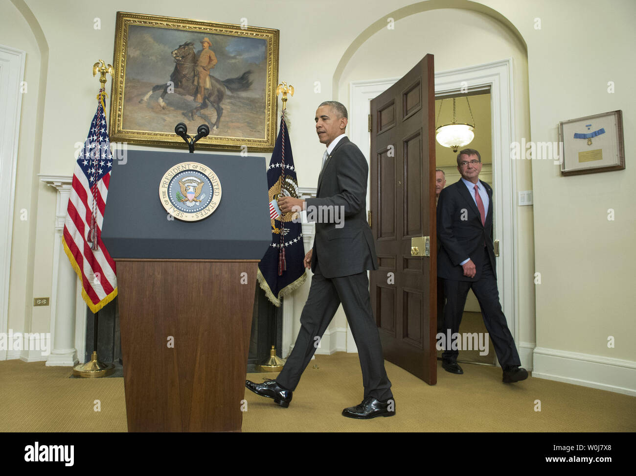 President barack obama arrives joint chiefs chairman gen joseph dunford ...