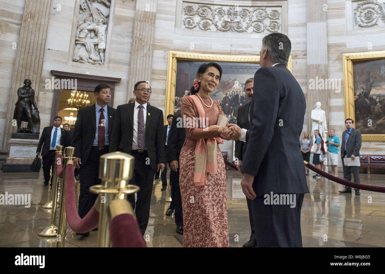 State Counsellor of Myanmar Aung San Suu Kyi (R) walks with Senate ...