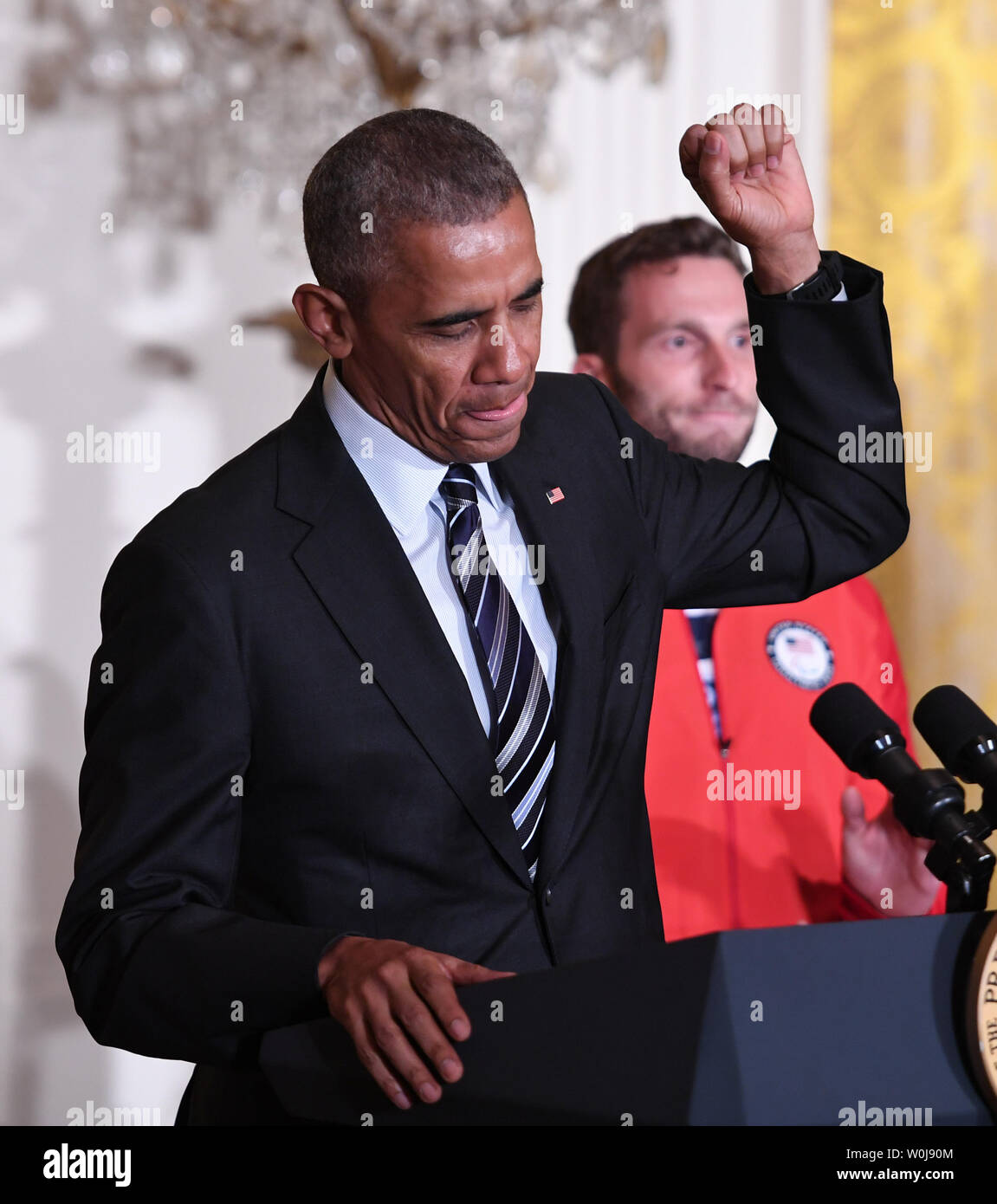 U.S. President Barack Obama makes victory salute during a welcoming ...