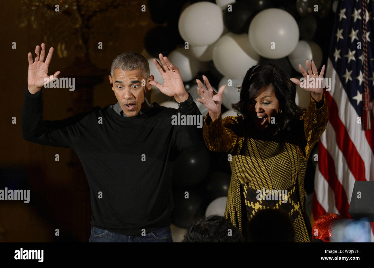 U.S. President Barack Obama and first lady Michelle Obama dance to the ...