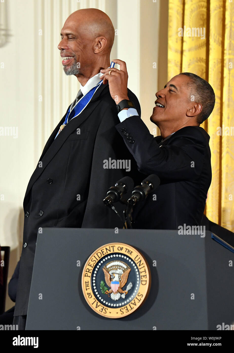 President Barack Obama awards the Presidential Medal of Freedom to basketball legend Kareem ...