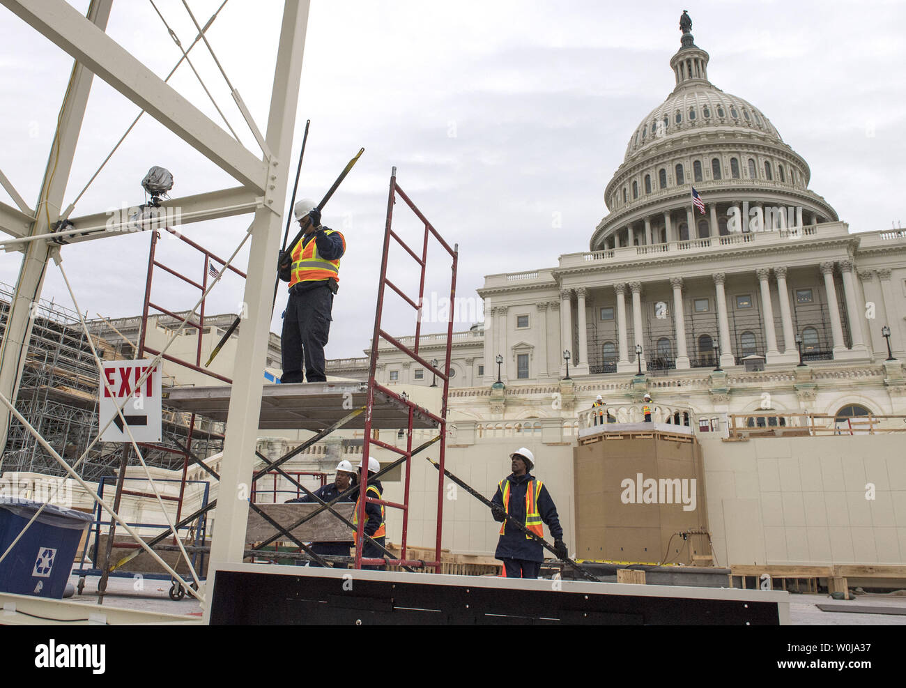 Construction workers continue building out the West Front of the ...