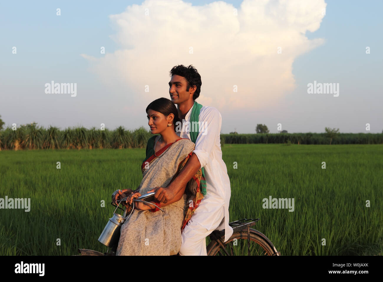 Indian man woman on bicycle hi-res stock photography and images - Alamy