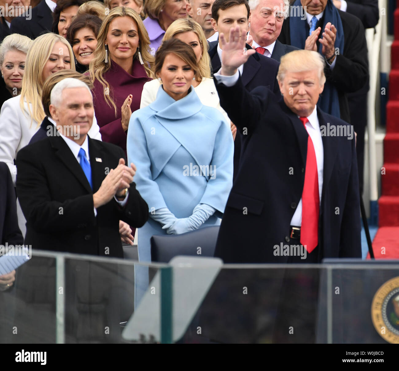 President-elect Donald J. Trump waves as he arrives for his ...