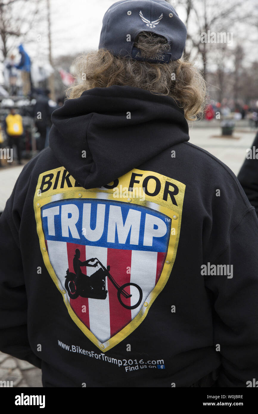 Bikers For Trump stand alongside the parade route near the Canadian ...