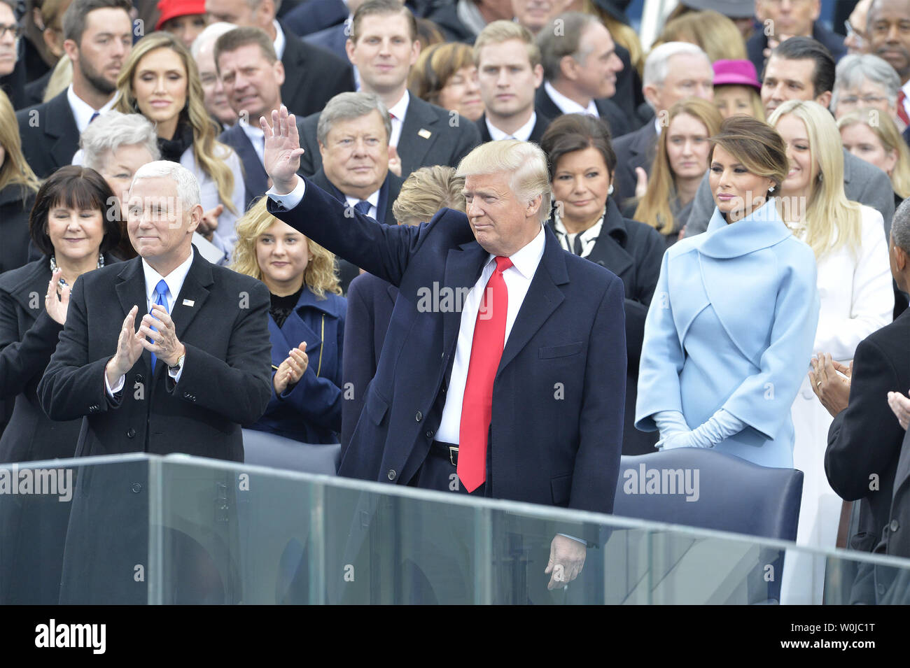 President Elect Donald Trump (C) waves at the inauguration ceremony at ...