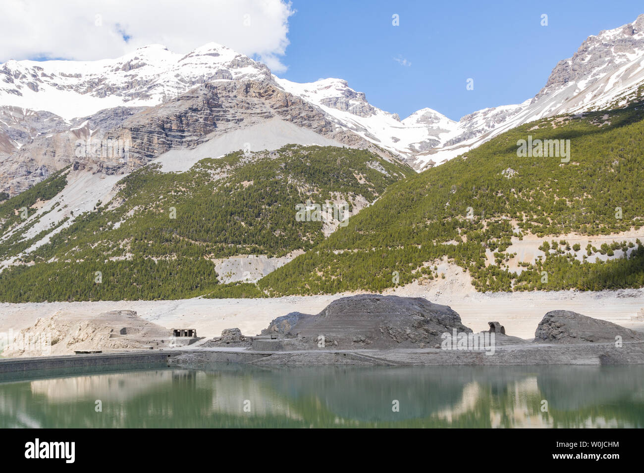 Alpine landscape with artificial lake, italy Stock Photo - Alamy