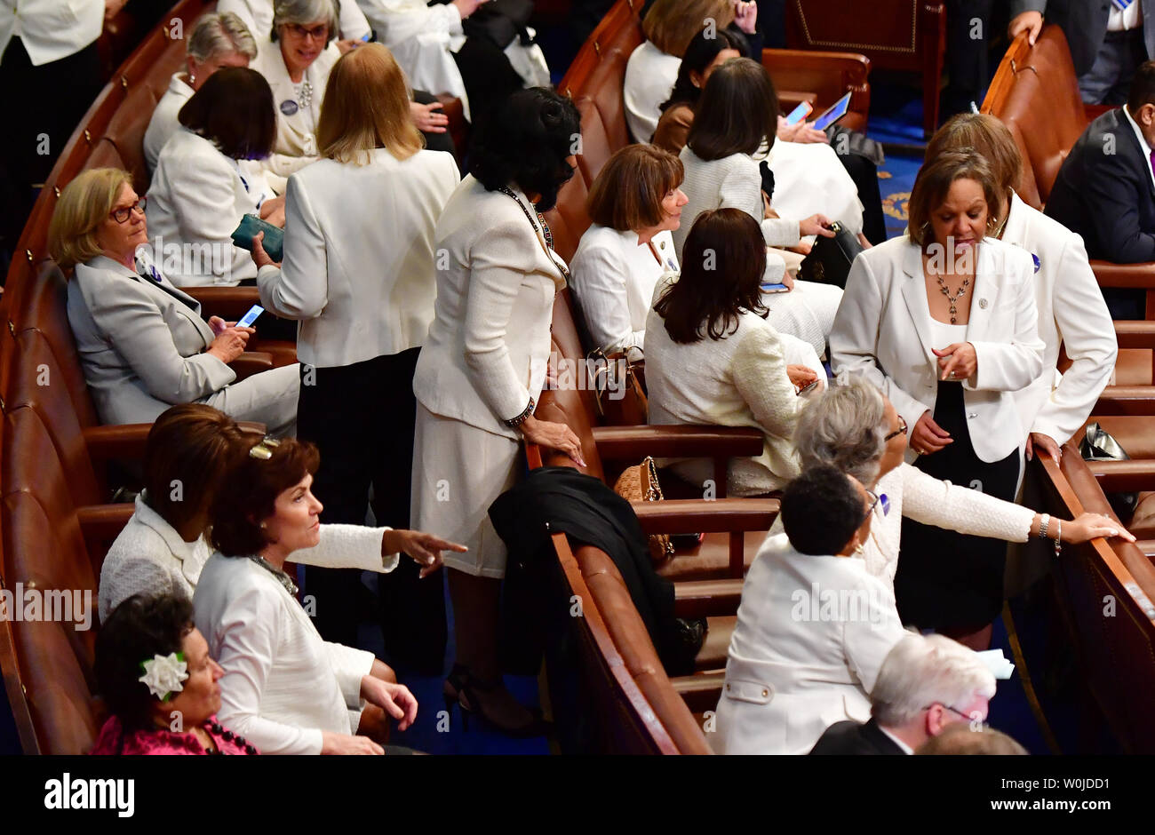 Female Democratic legislators wear all white as a symbol of unity and ...