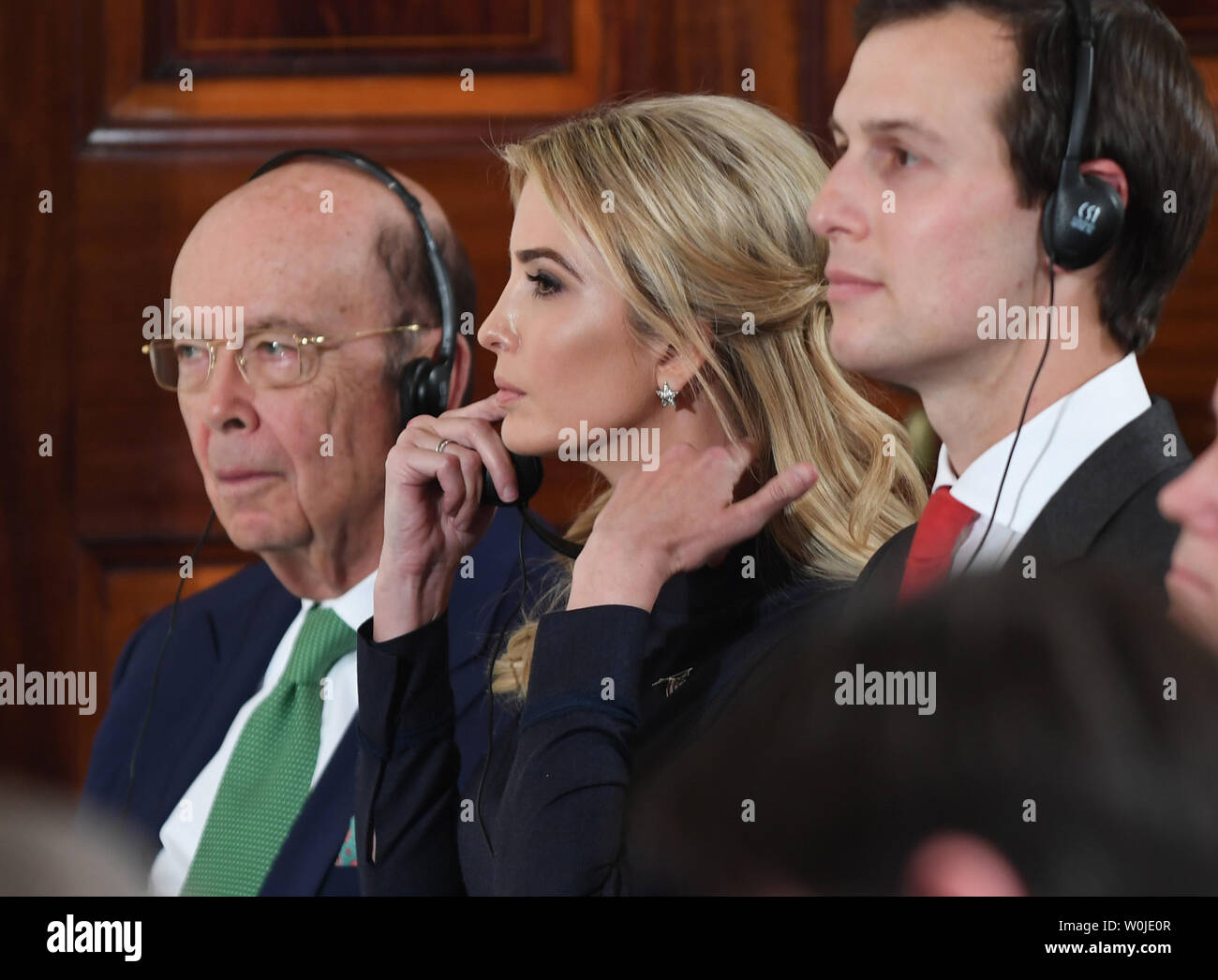 United States Secretary of Commerce Wilbur Ross (L) Ivanka Trump (C ...