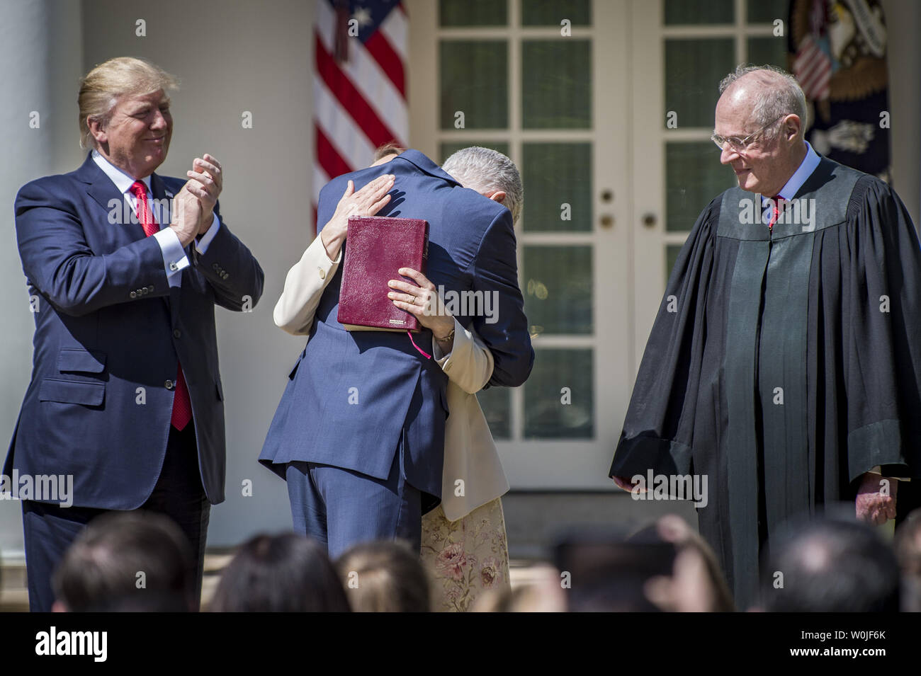 President Donald Trump and Supreme Court Justice Anthony Kennedy look ...