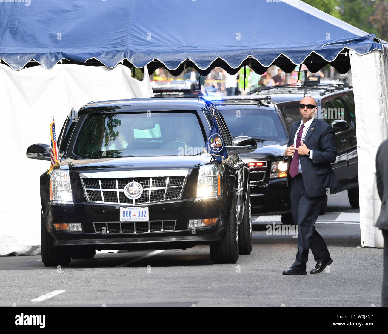 The presidential limo sits outside the Veterans Department building on ...
