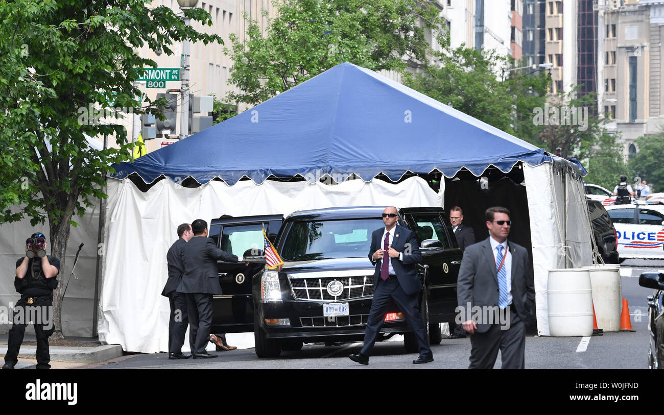 The presidential limo sits outside the Veterans Department building on ...