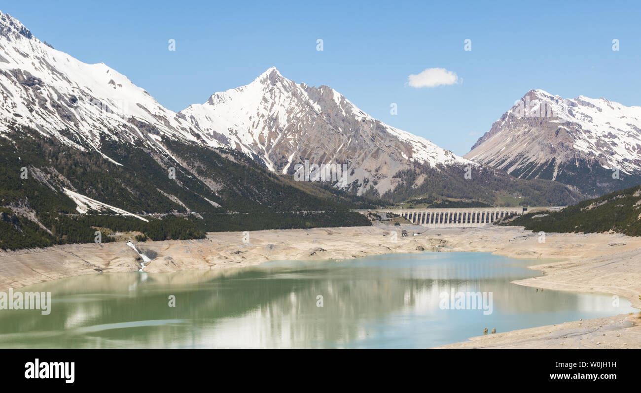 Alpine landscape with artificial lake, italy Stock Photo - Alamy