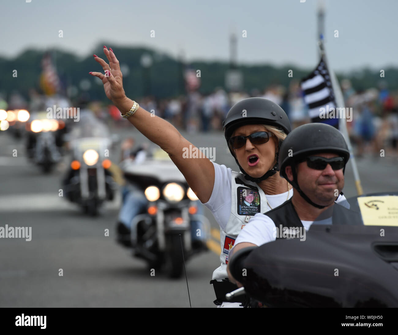 Participants in the annual Rolling Thunder Ride for Freedom make their way over Memorial Bridge ...