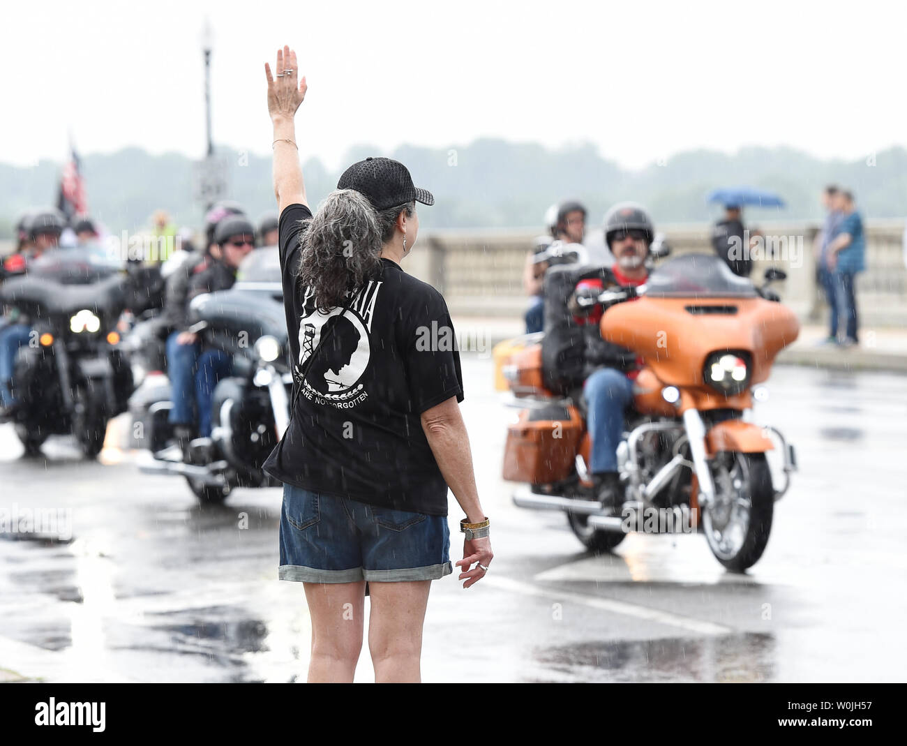 Participants in the annual Rolling Thunder Ride for Freedom make their ...