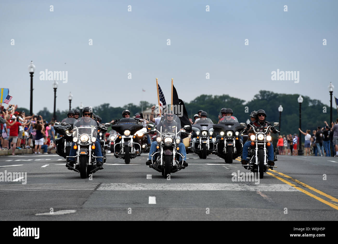 Participants in the annual Rolling Thunder Ride for Freedom make their way over Memorial Bridge ...