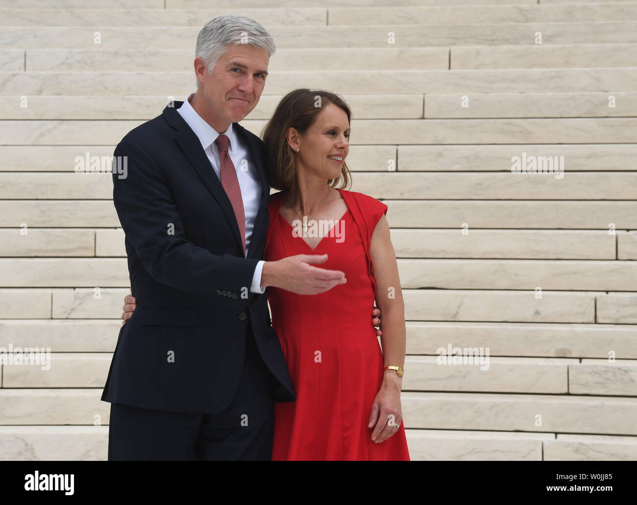 Associate Justice Neil Gorsuch stands with his wife Marie Louise on the ...