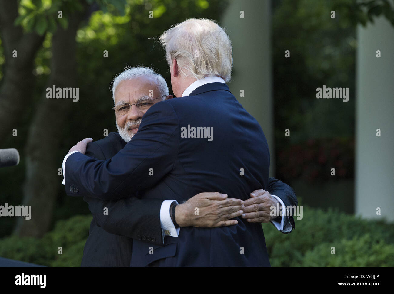 Indian Prime Minister Narendra Modi hugs President Donald Trump after ...
