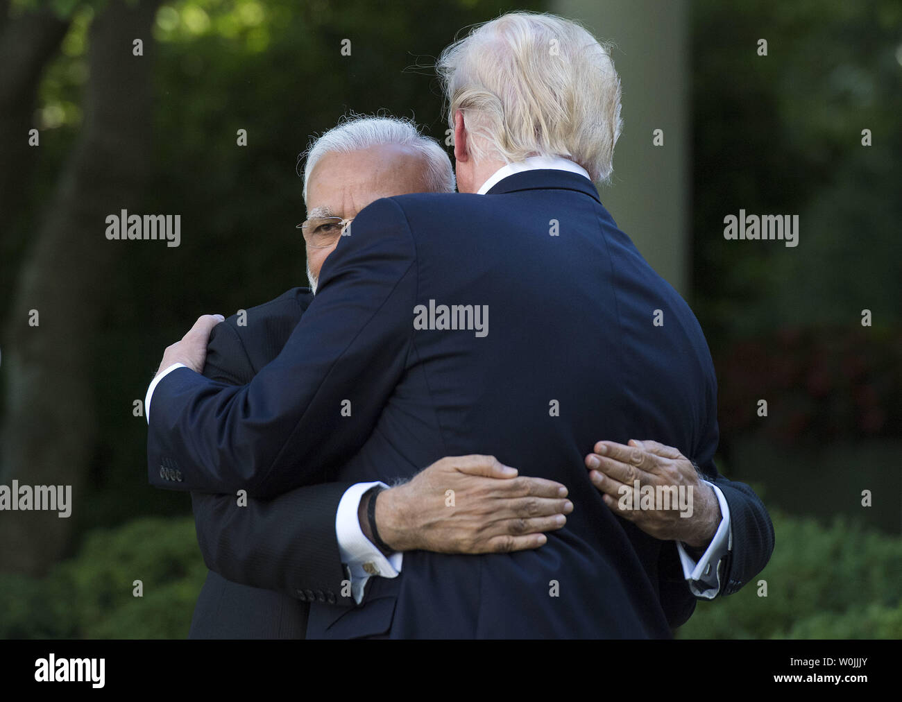Indian Prime Minister Narendra Modi hugs President Donald Trump after ...