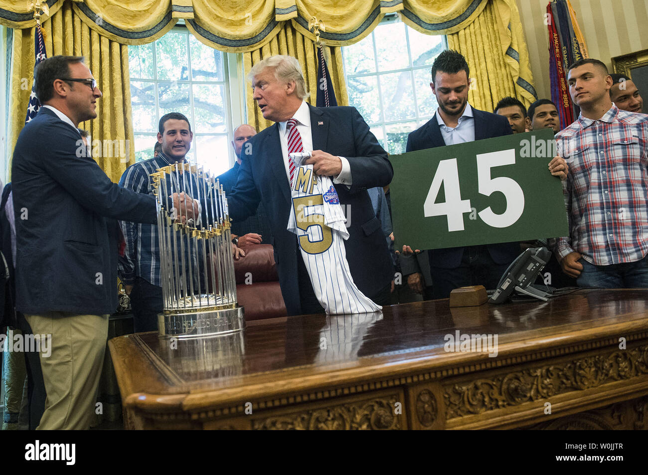President Donald Trump shakes hands with Todd Ricketts, one of the Cubs ...