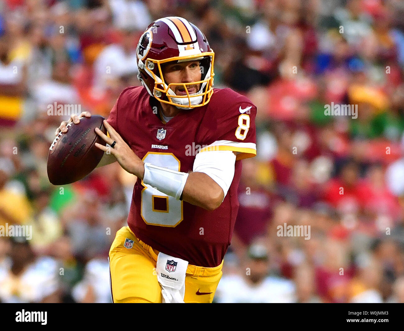 Washington Redskins quarterback Kirk Cousins passes against the Green ...
