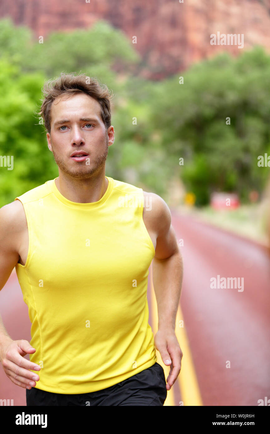 Fitness sport runner man running determined and focused with ...