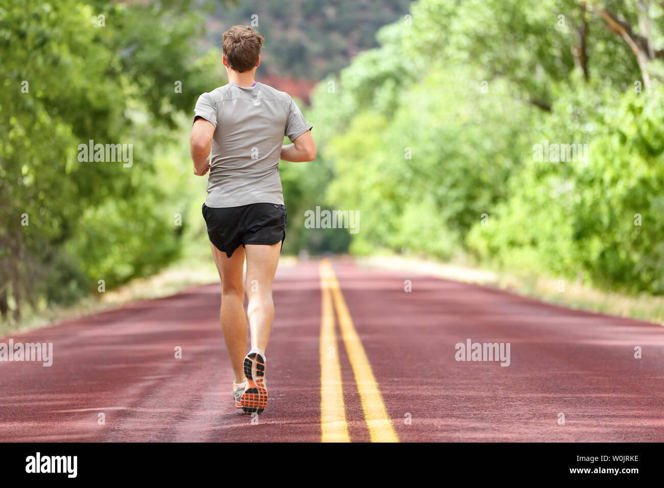 Man sprinting behind hi-res stock photography and images - Alamy