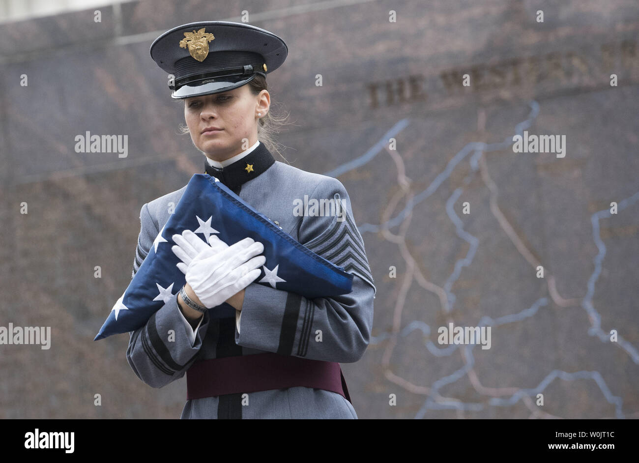 A West Point cadet holds a flag in honor of Gen. John Pershing, the ...