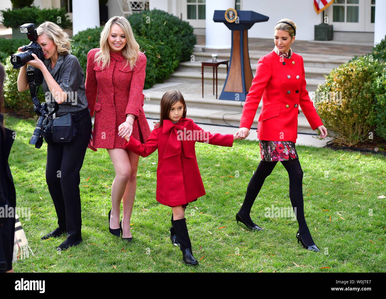 President Donald Trump's daughters Ivanka (R) and Tiffany (L) walk with ...