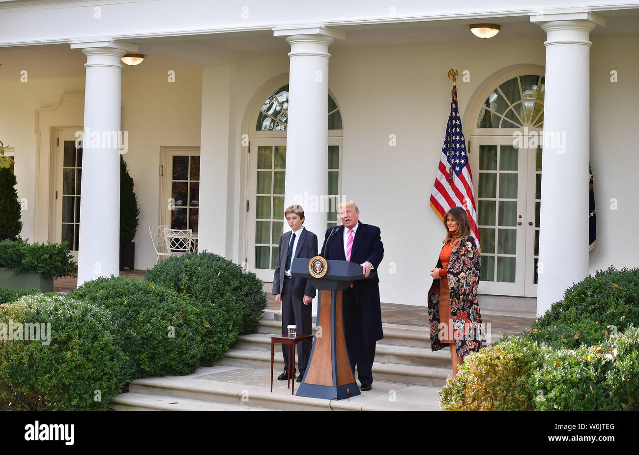 President Donald Trump, joined by his son Barron and the First Lady ...