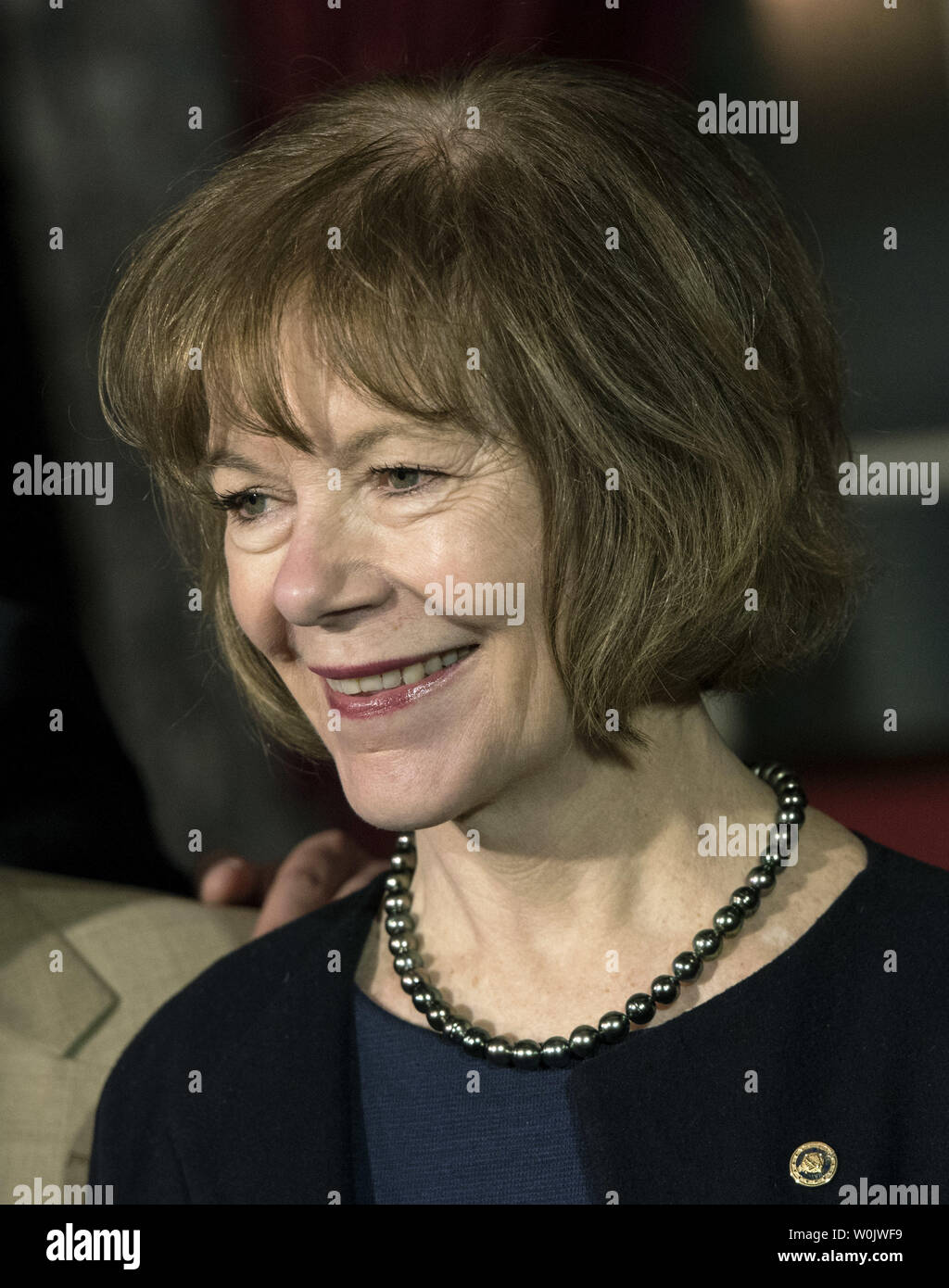 Newly elected Senator Tina Smith, D-MN, smiles after being sworn into ...