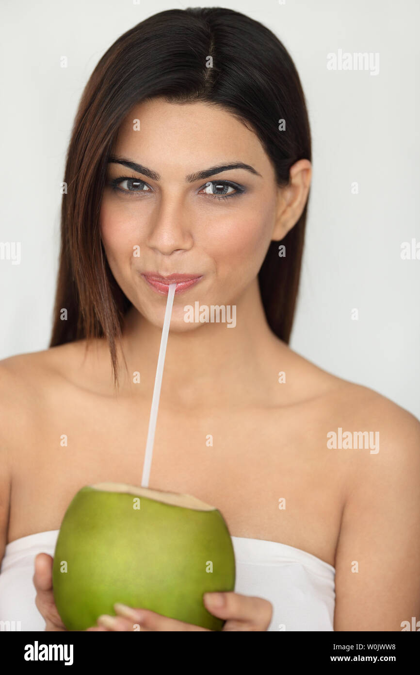 Girl drinking coconut water hi-res stock photography and images - Alamy
