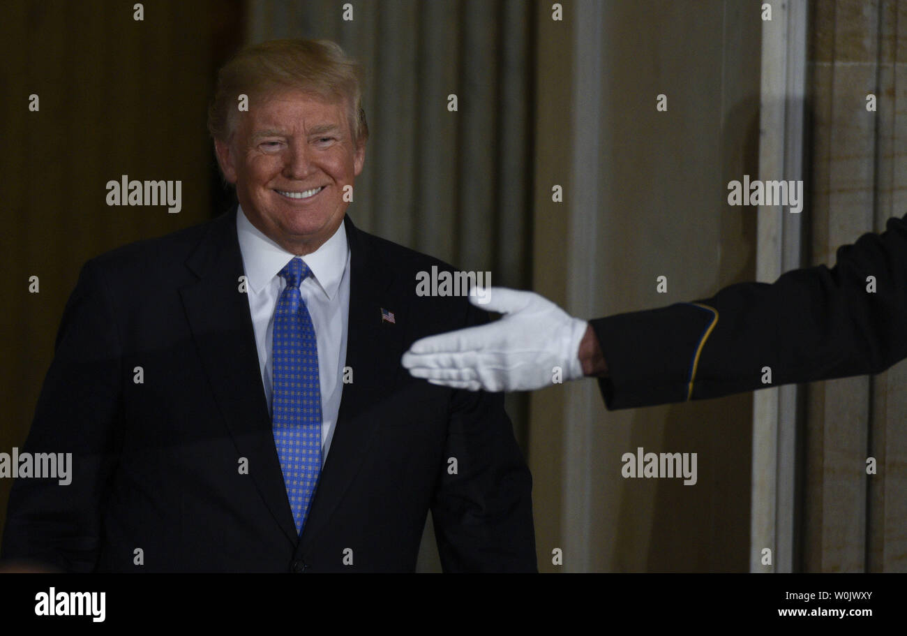 President Trump enters the Rotunda during the Congressional Gold Medal ...