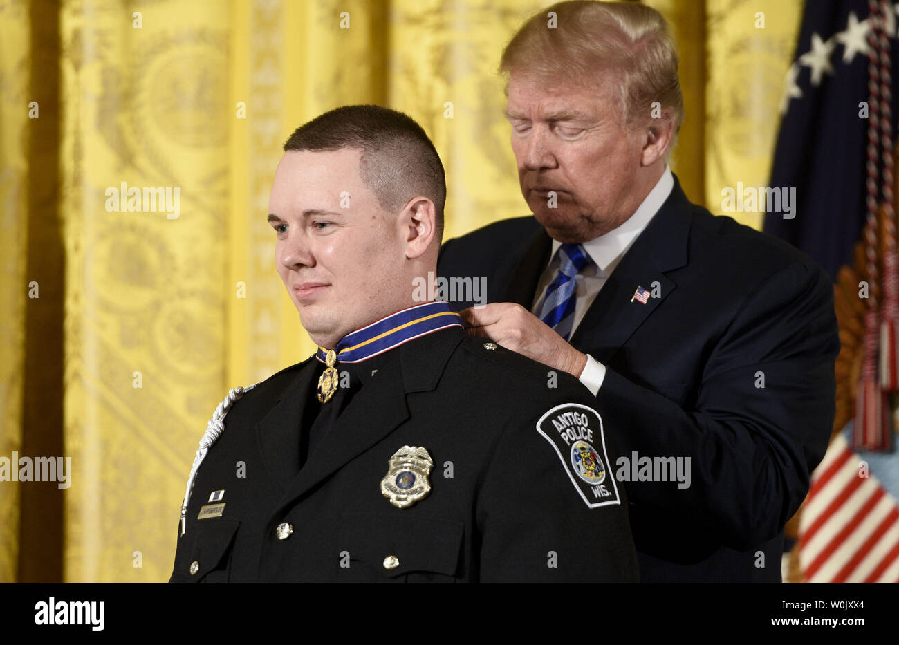 Officer Andrew Hopfensperger, Jr., Antigo Police Department (WI), is ...