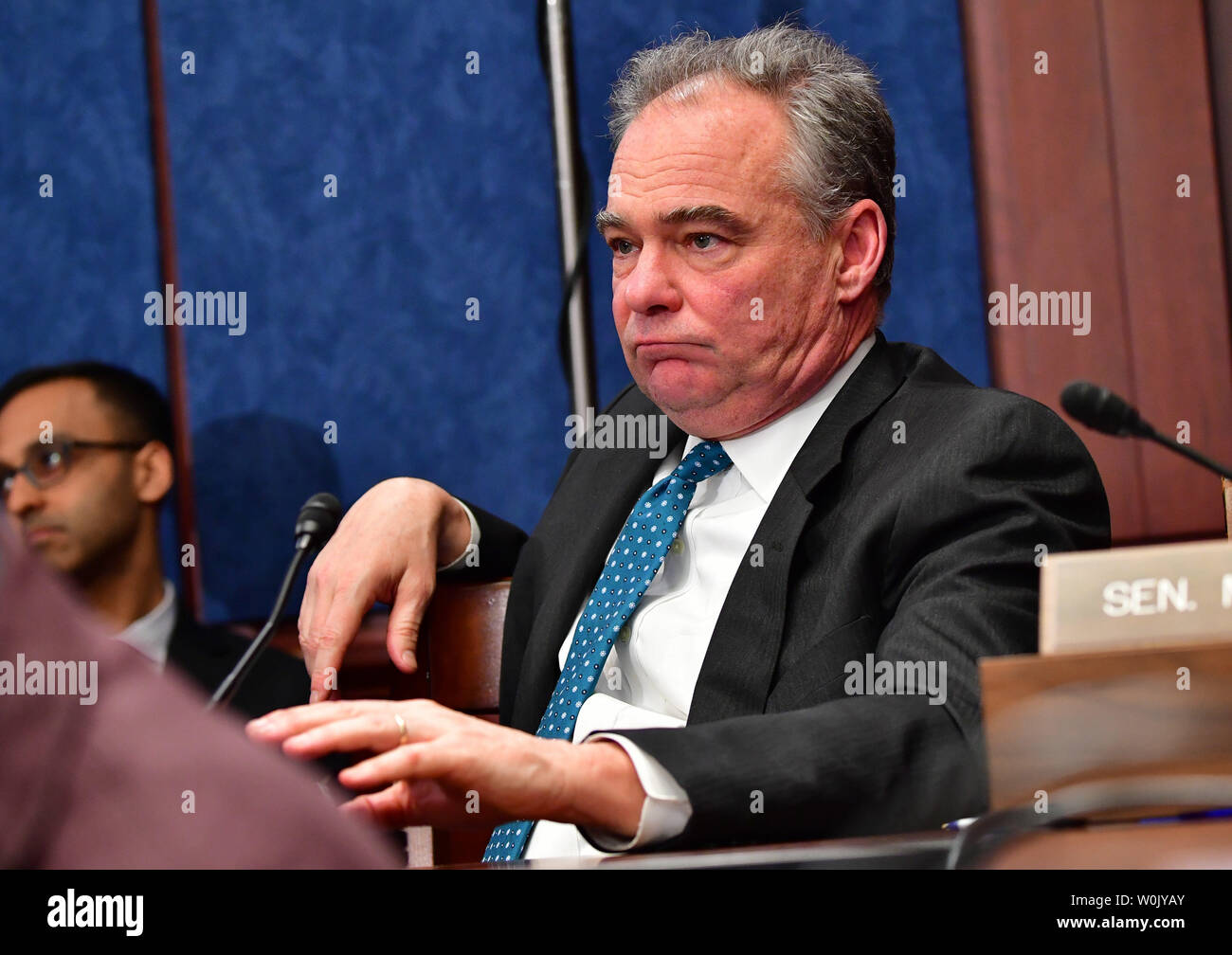 Sen. Tim Kaine, D-VA, listens during a Senate Democratic Policy and ...
