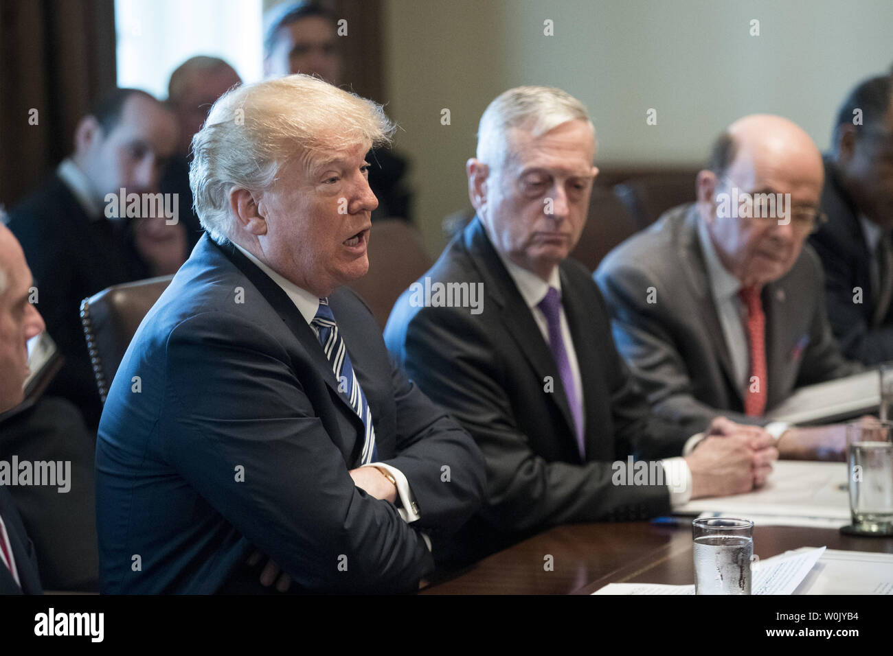 US President Donald J. Trump speaks beside US Secretary of Defense Jim ...
