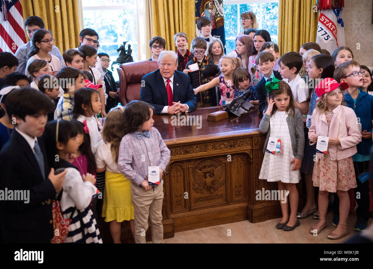 President Donald Trump meets with children in the Oval Office on "Take ...