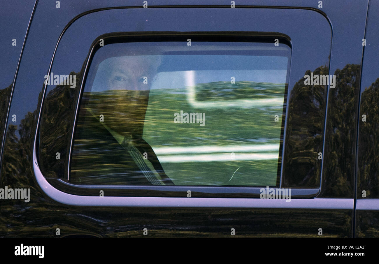 President Donald Trump rides in a SUV after arriving at Walter Reed ...