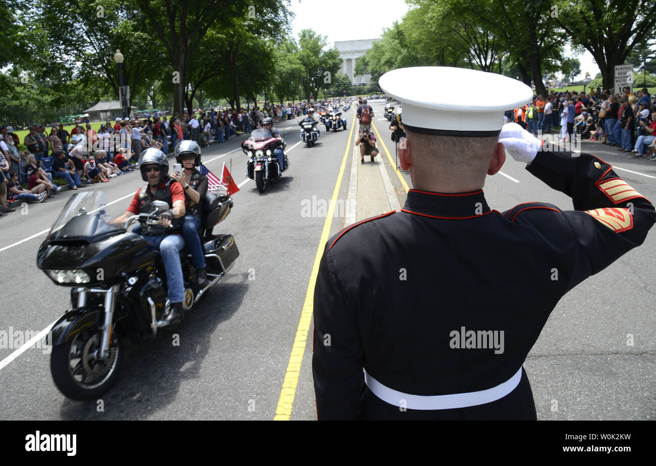 Retired USMC SSGT Tim Chambers, as he has done for years, salutes ...